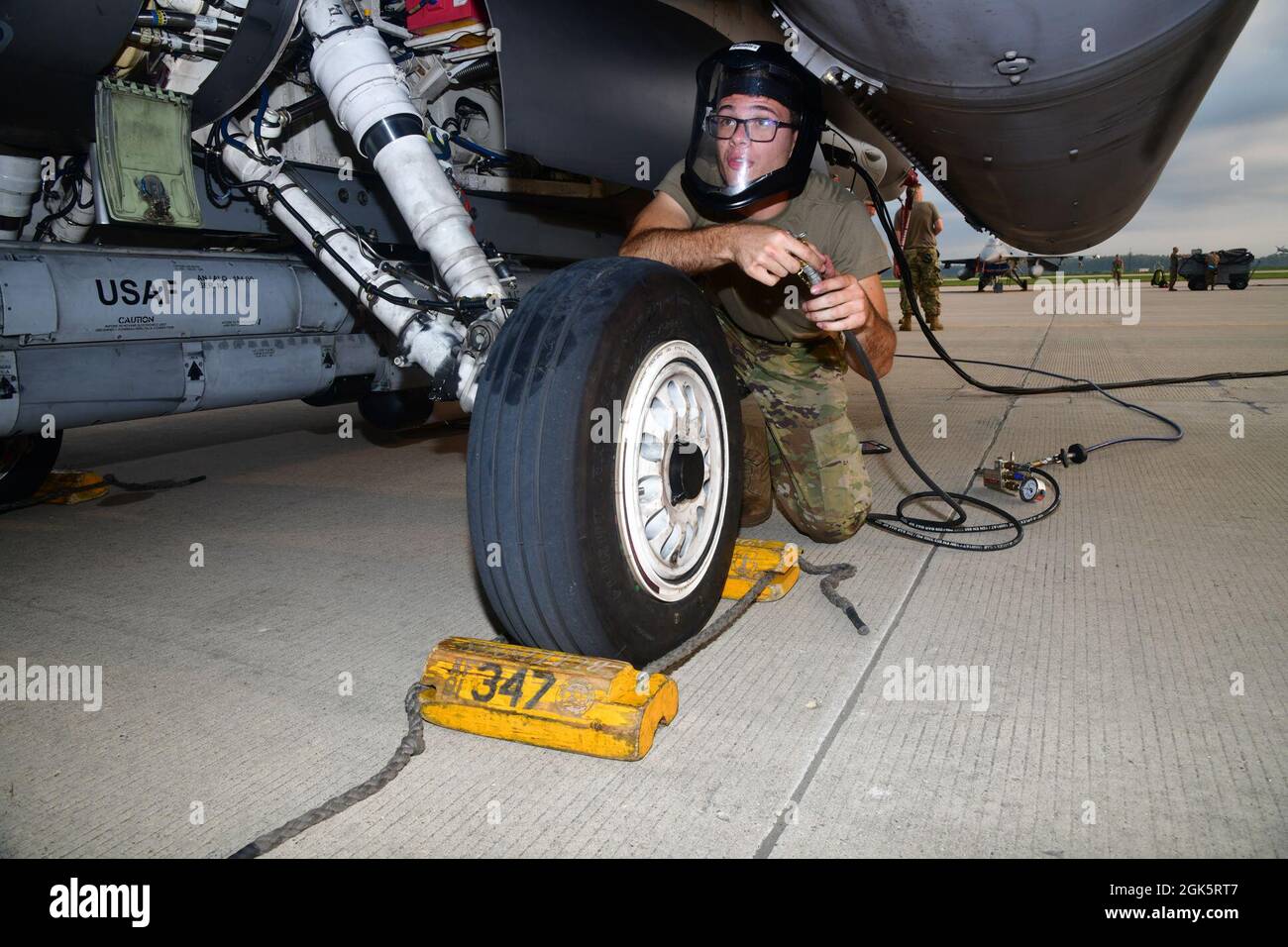 A tactical aircraft maintenance specialist, or crew chief, assigned to ...