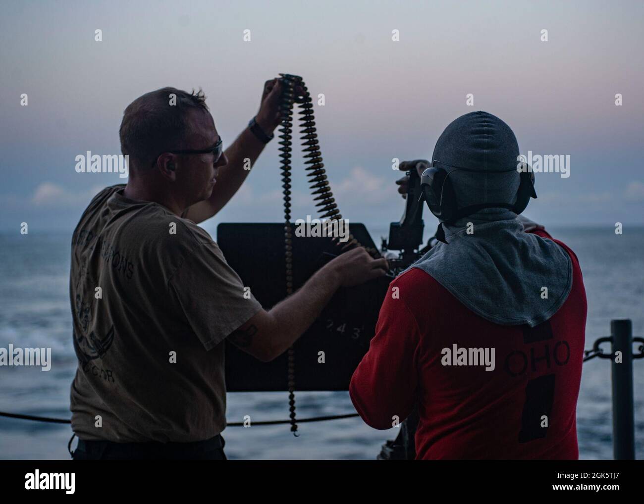 Gunner's Mate 1st Class Dustin Jones, right, from Dayton, Ohio ...