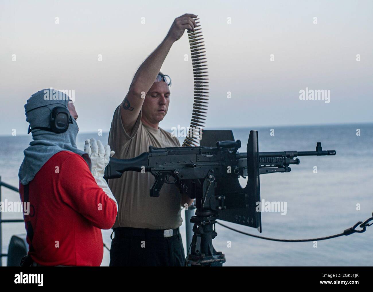 Gunner's Mate 1st Class Dustin Jones, right, from Dayton, Ohio ...