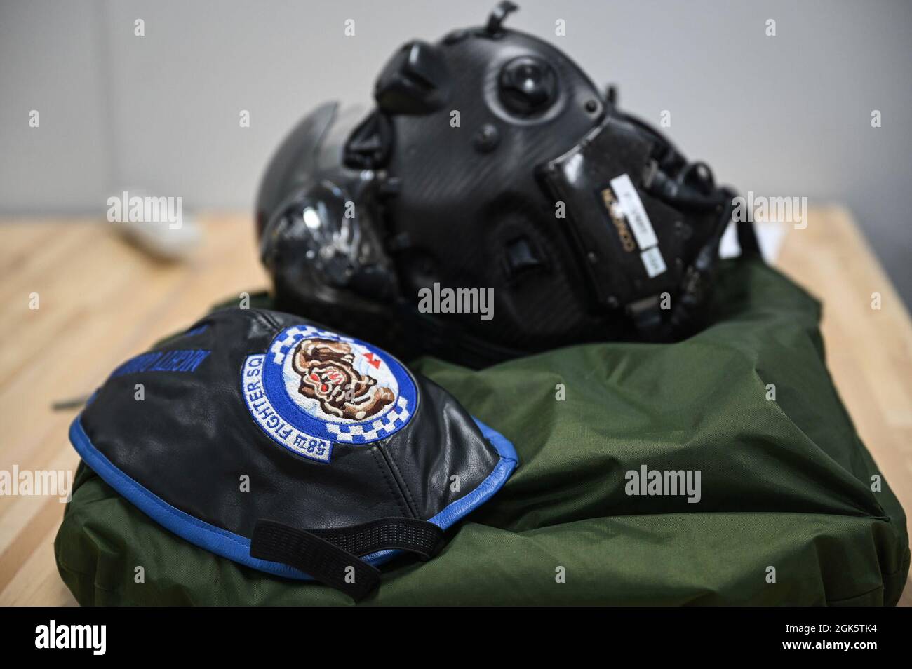 An F-35A Lightning II helmet is set out for inspection during a ...