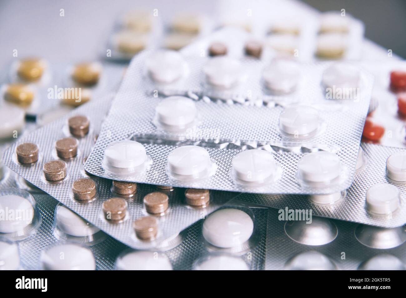 Overall view of pharmaceutical tablets and capsules in packages in ...