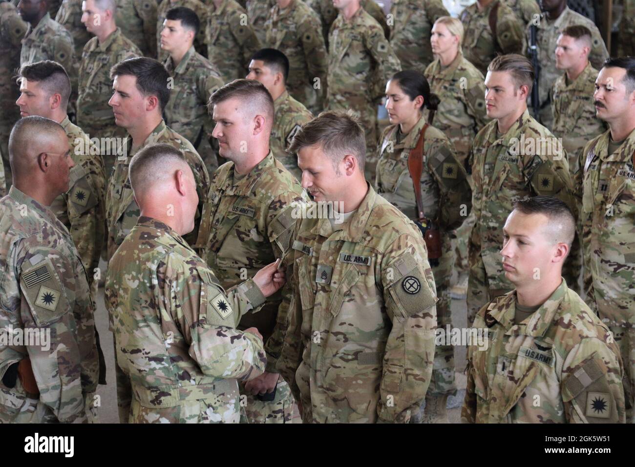 Task Force Phoenix Commander Col. Alan Gronewold places the 40th ...