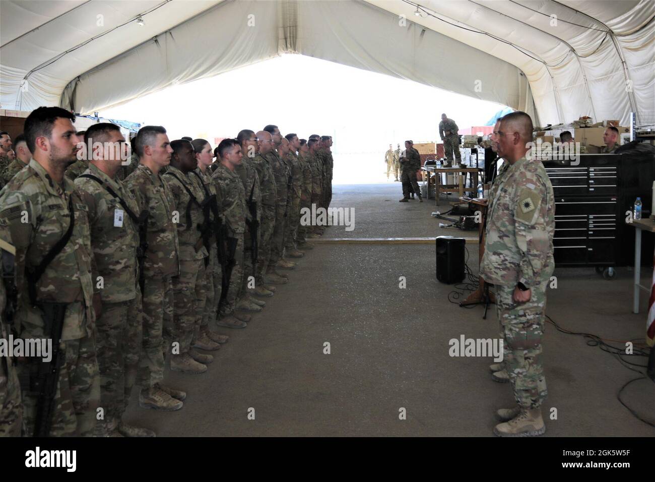 Task Force Wolfpack Soldiers stand at attention in front of Task Force ...