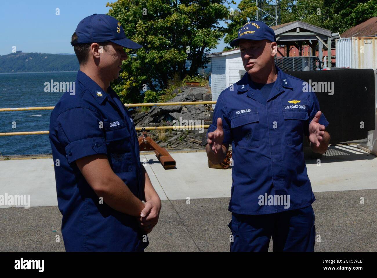 Rear Adm. Melvin Bouboulis, commander, 13th District, acknowledges ...
