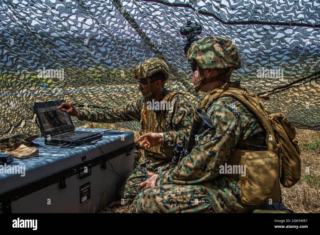 U.S. Marines with 1st Battalion, 3d Marines, operate a Stalker unmanned ...