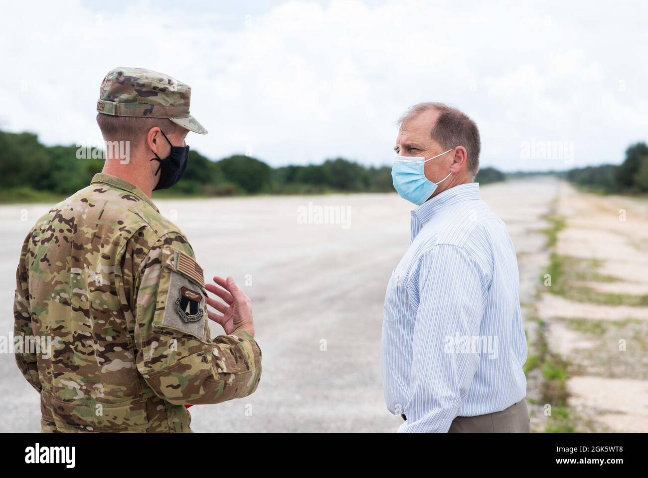 Congressional Delegate Staffer Robert Winkler, right, speaks with Lt ...