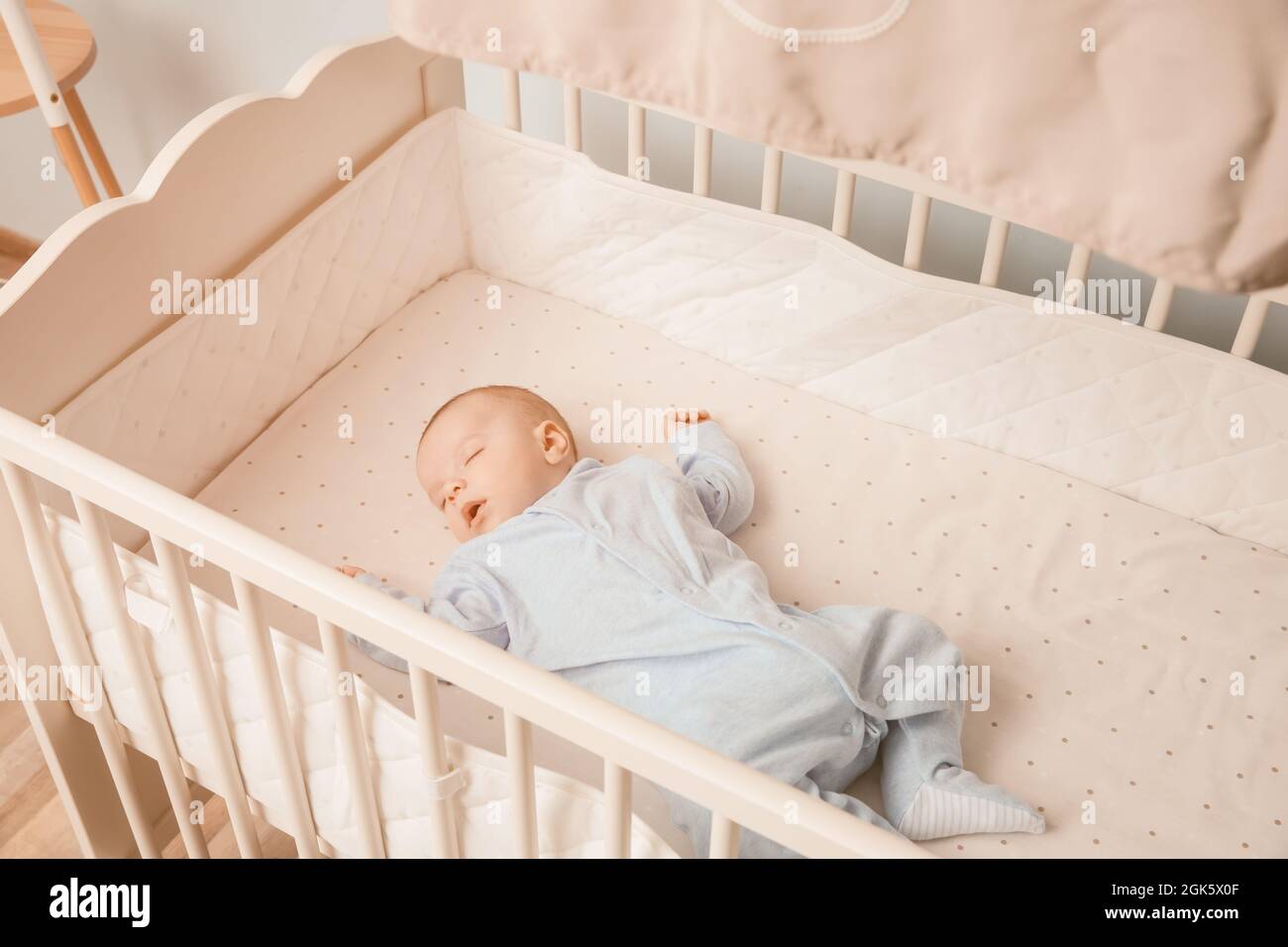 Cute little baby sleeping in cradle at home Stock Photo - Alamy