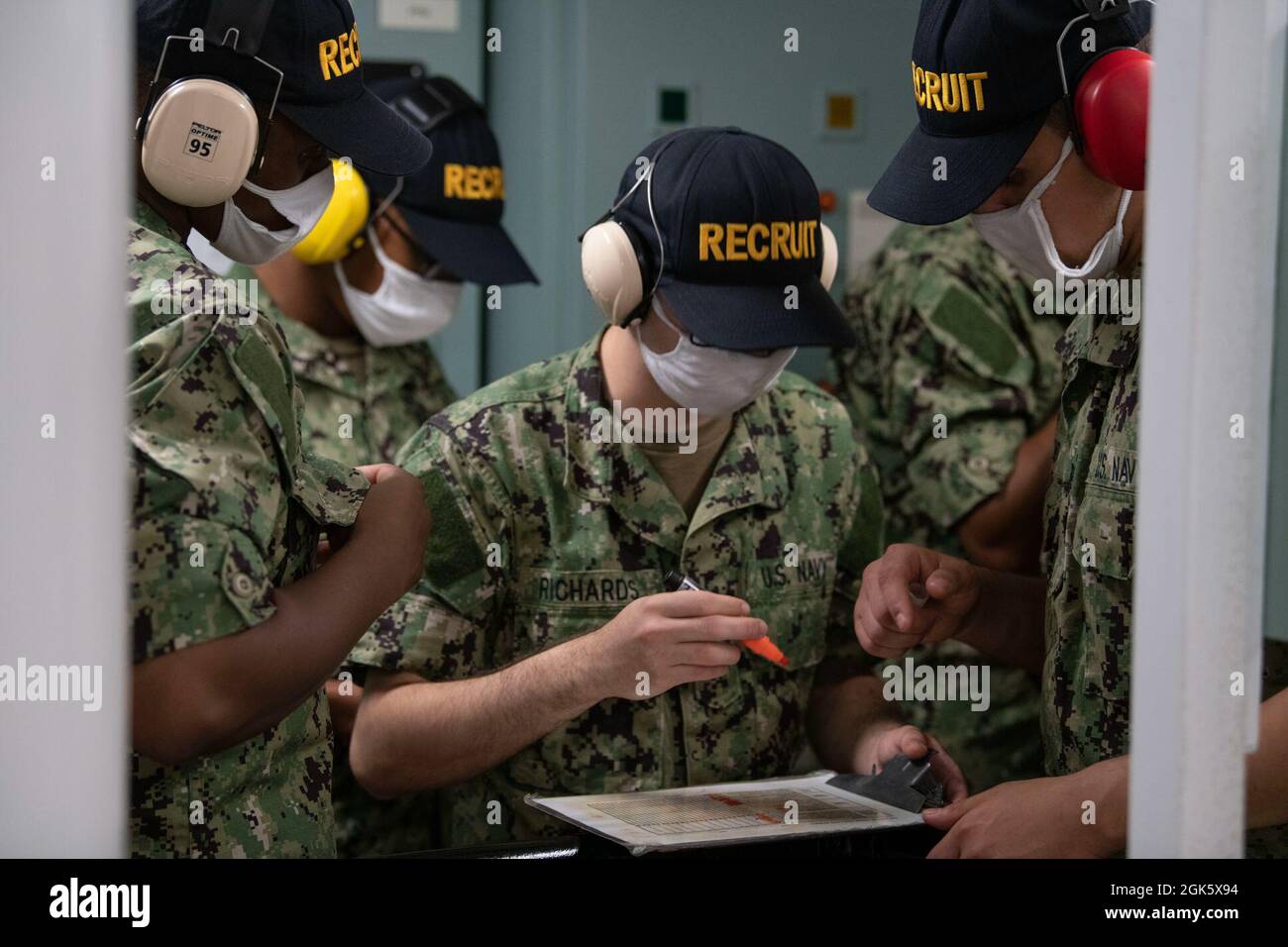 Recruits participate in a training scenario inside of the Battle ...