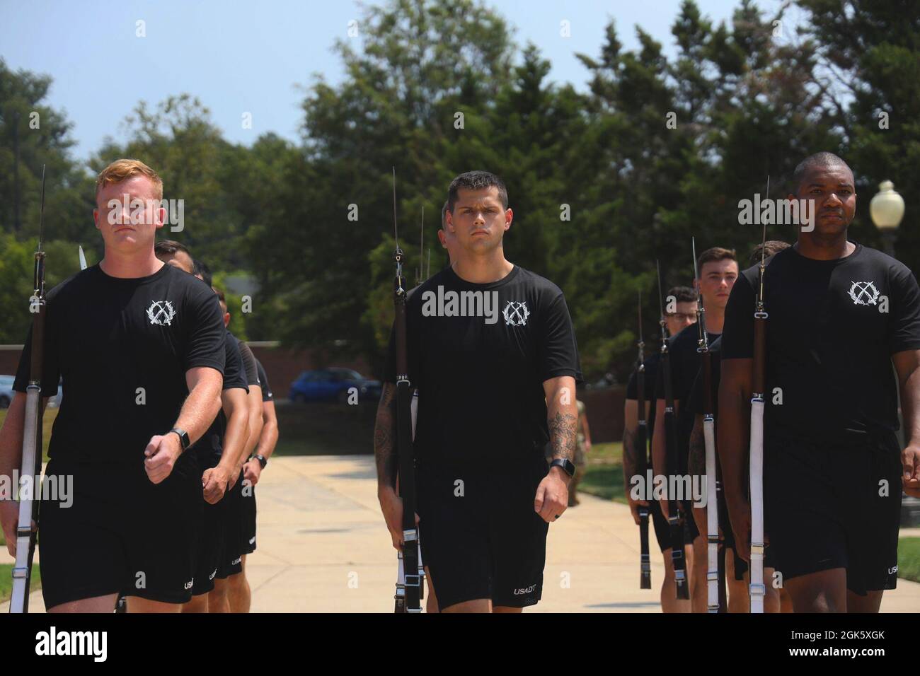 U.S. Army Drill Team members participate in a drill performance at ...
