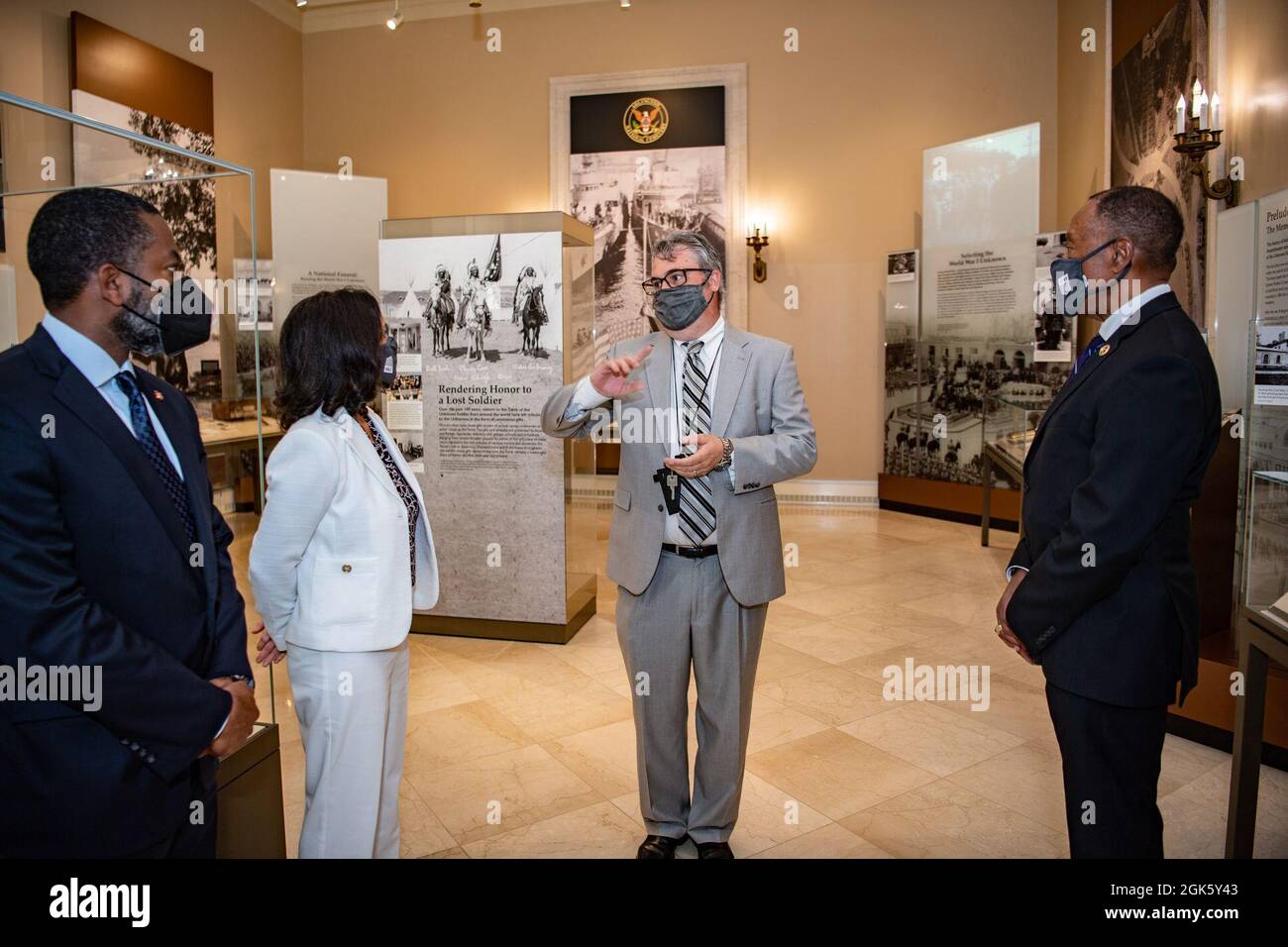 Rod Gainer (center), historian, Arlington National Cemetery, gives a ...