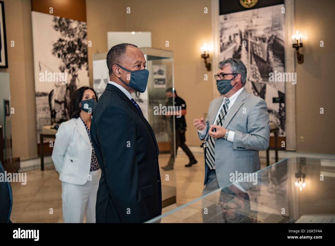 Rod Gainer (right), historian, Arlington National Cemetery, gives a ...