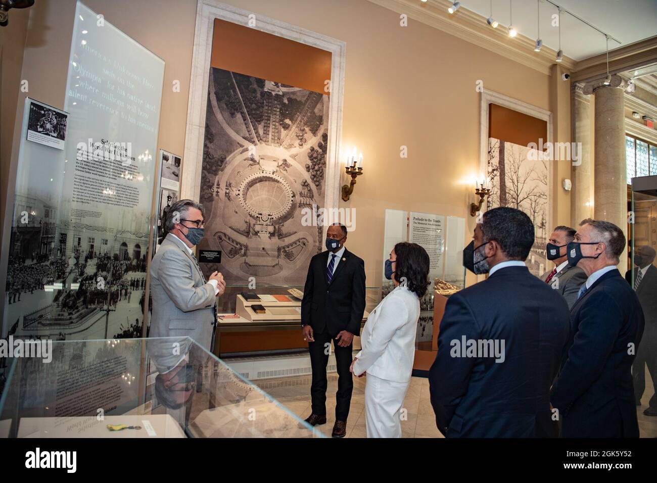 Rod Gainer (left), historian, Arlington National Cemetery, gives a tour ...