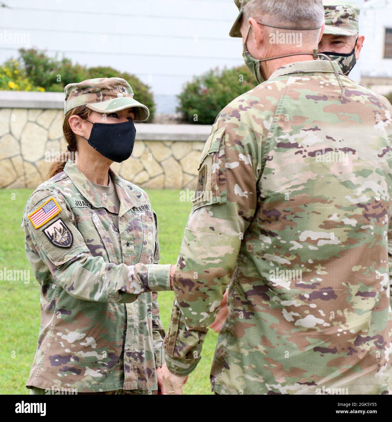 Brigadier Gen. Maria Juarez, left, deputy commanding general for ...