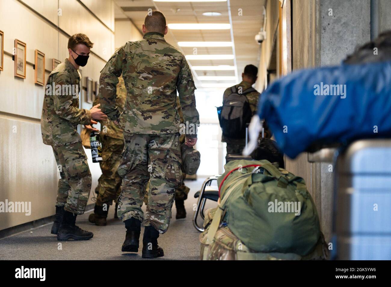 Airmen from the 142nd Wing prepare to leave in support of OPLAN Smokey ...