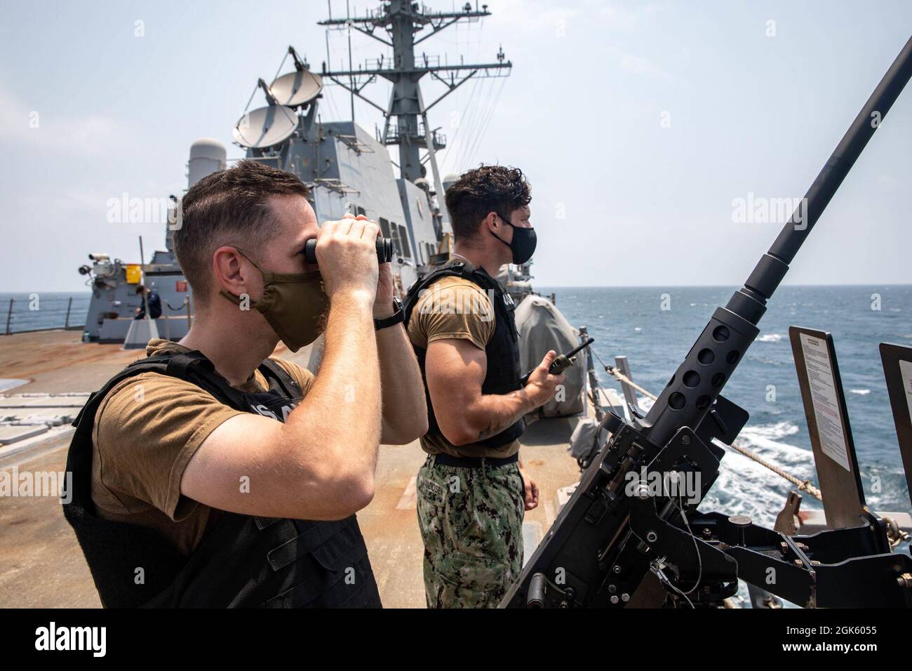 STRAIT OF HORMUZ (Aug. 11, 2021) – Sailors stand watch aboard guided ...