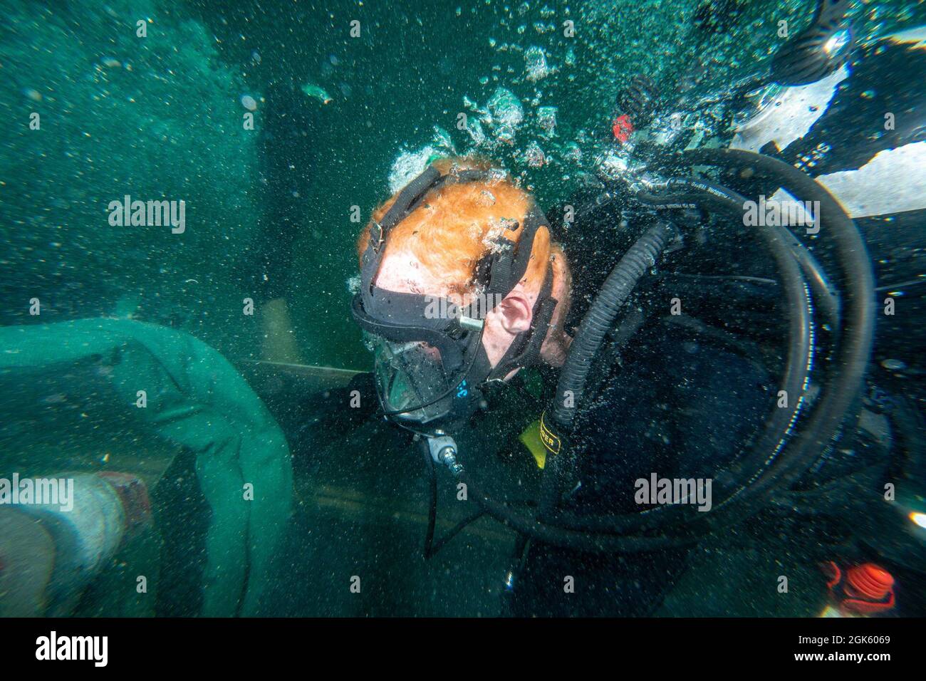 Navy Diver 3rd Class Aiden Lockard, assigned to Mobile Diving Salvage ...