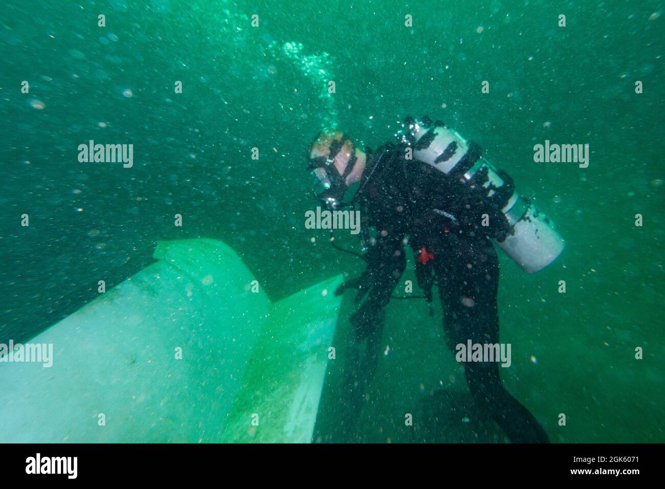 Navy Diver 3rd Class Aiden Lockard, assigned to Mobile Diving Salvage ...