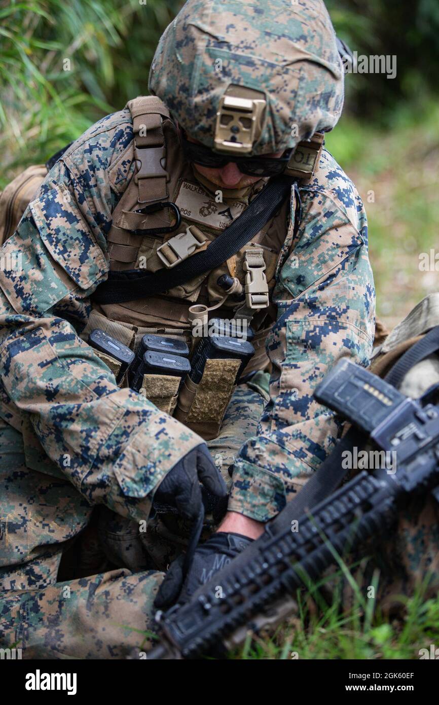 U.S. Marine Corps Lance Cpl. Mason Walker, a combat engineer with Marine Wing Support Squadron ...