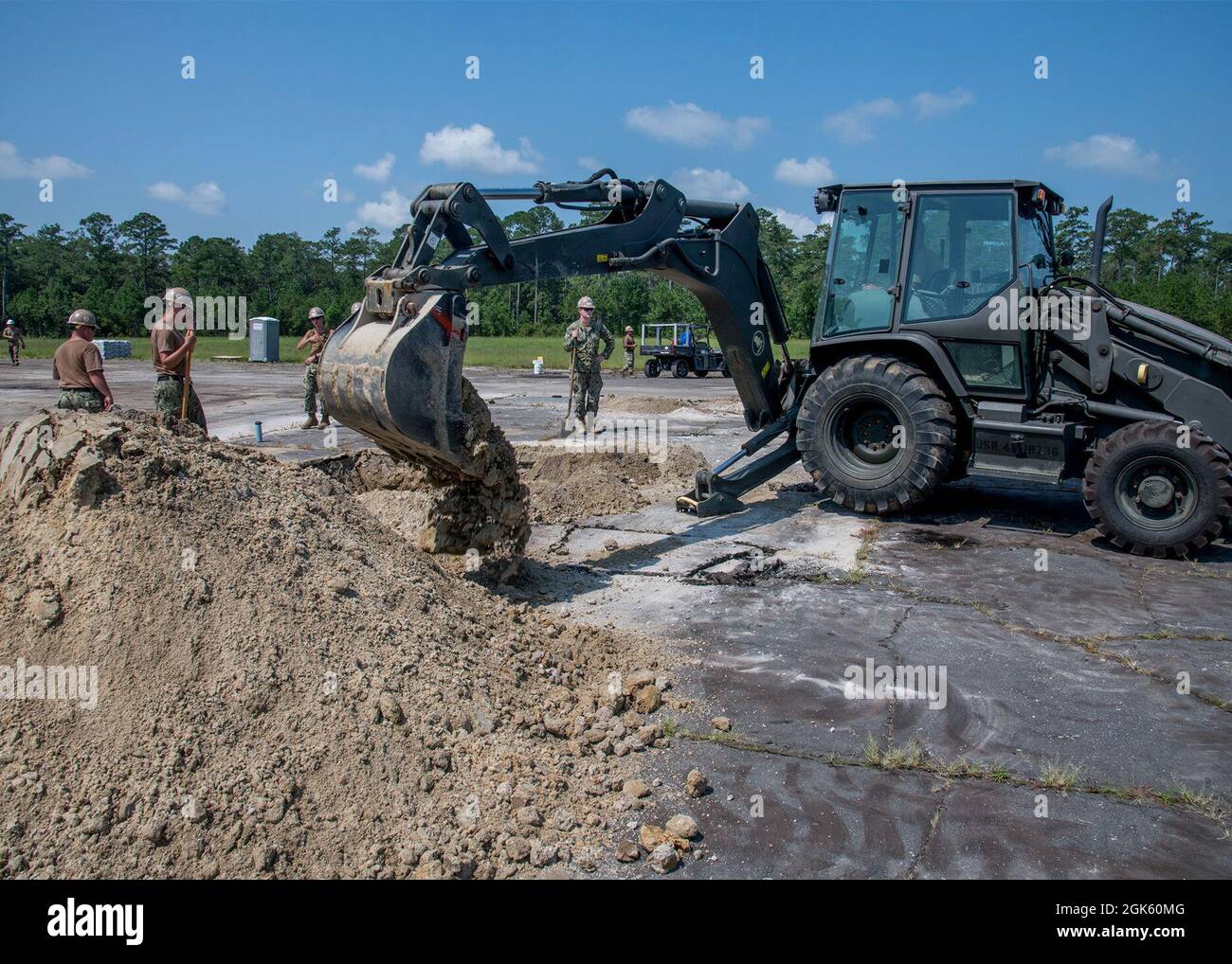 Seabees from Naval Mobile Construction Battalion (NMCB) 133, operate a ...
