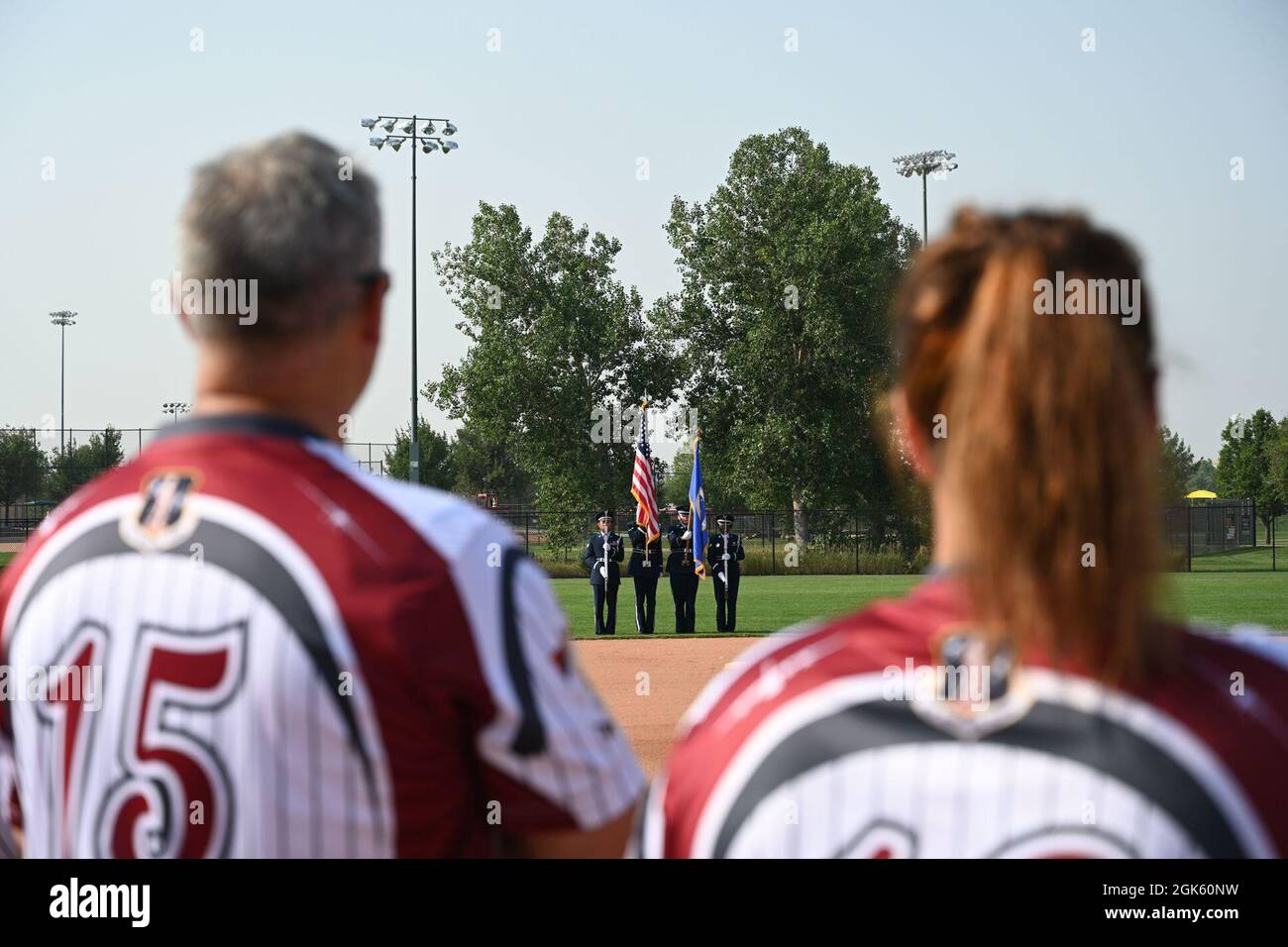 U.S. Air Force honor guard stands at attention in center field at the ...