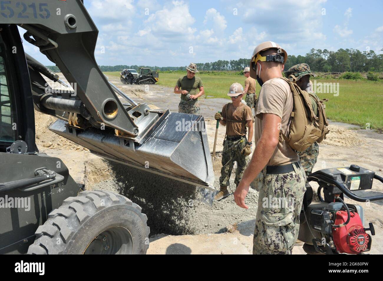 Seabees from Naval Mobile Construction Battalion (NMCB) 133, and ...