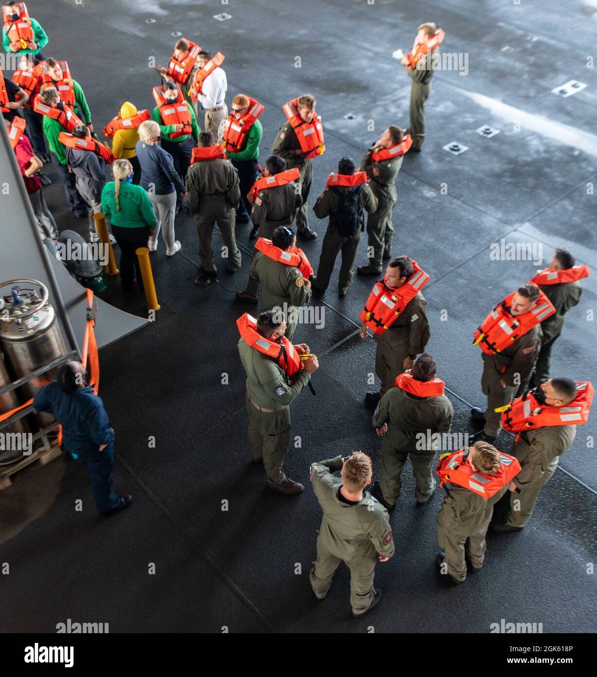 210811-N-WY048-2015 PACIFIC OCEAN (Aug. 11, 2021) – Sailors assigned to ...
