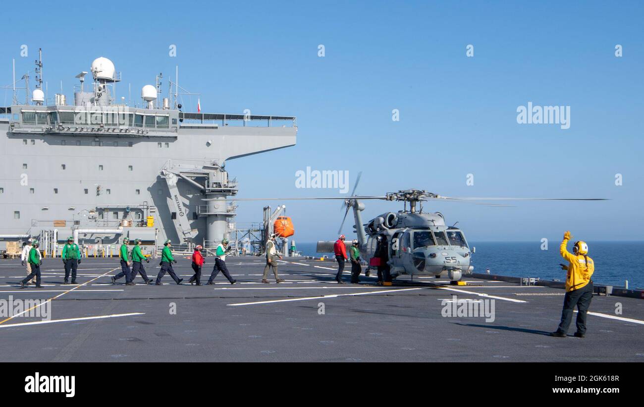 210811-N-WY048-2058 PACIFIC OCEAN (Aug. 11, 2021) – Sailors assigned to ...