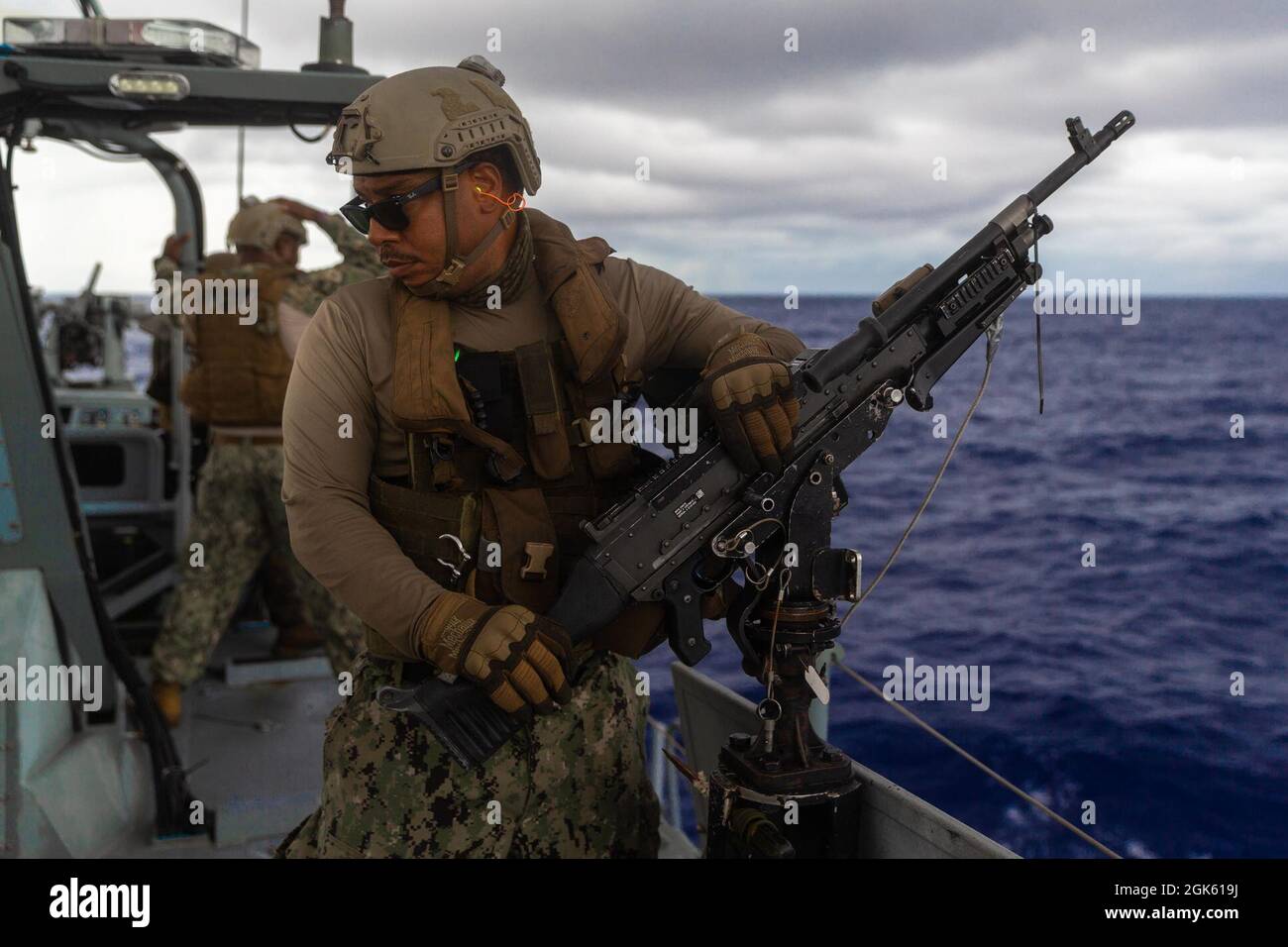 A U.S. Navy Sailor with Coastal Riverine Group 1 (CRG 1) prepares to ...