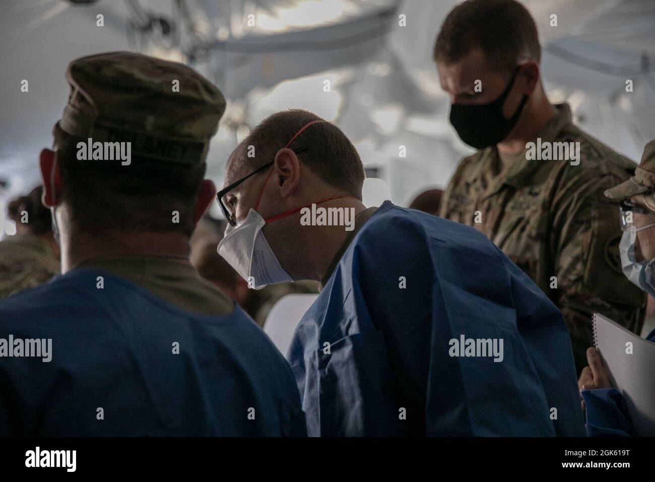 Col. James Ferguson, lead surgeon for 18th Field Hospital, assesses the ...