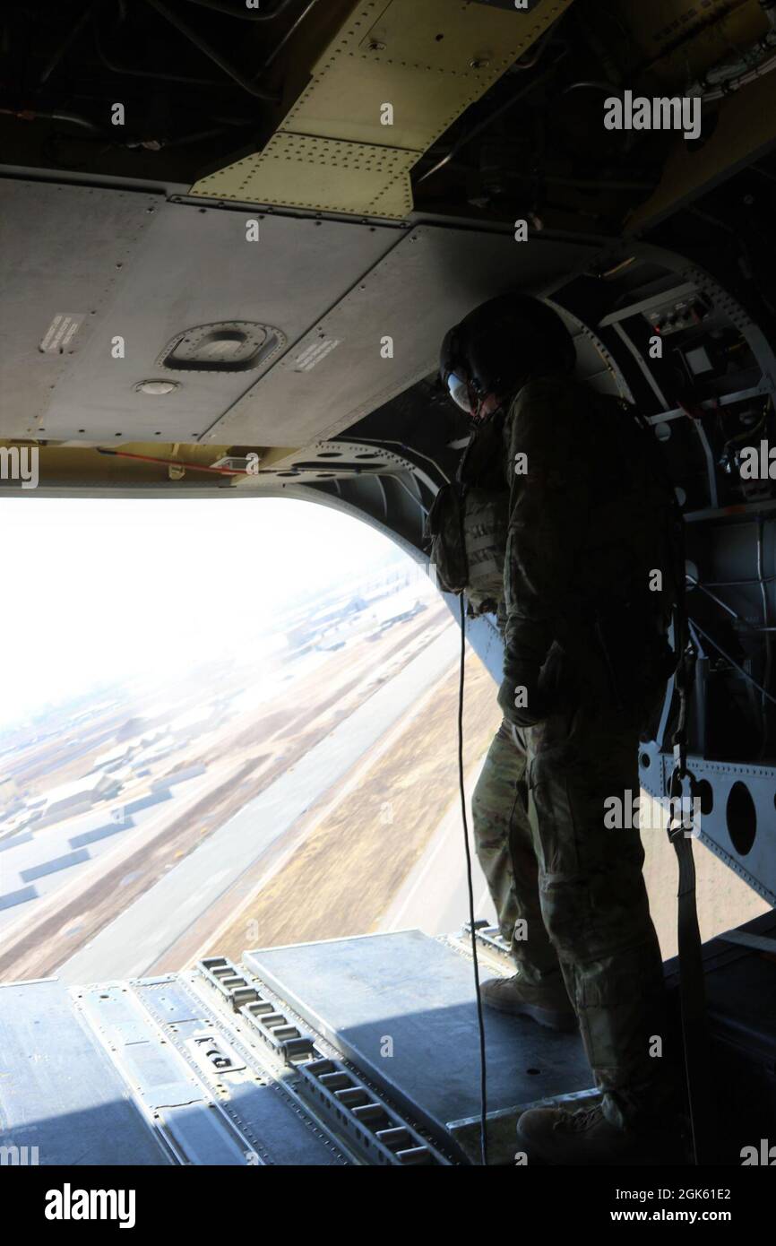 Staff Sgt. Mike Gabrysiak stands on the ramp of a CH-47 Chinook ...