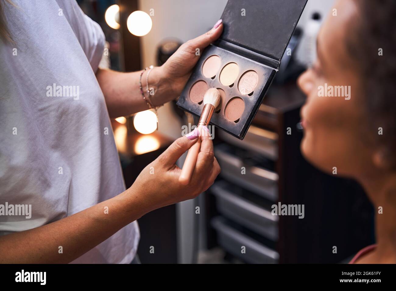 Close up makeup artist using hi-res stock photography and images - Alamy