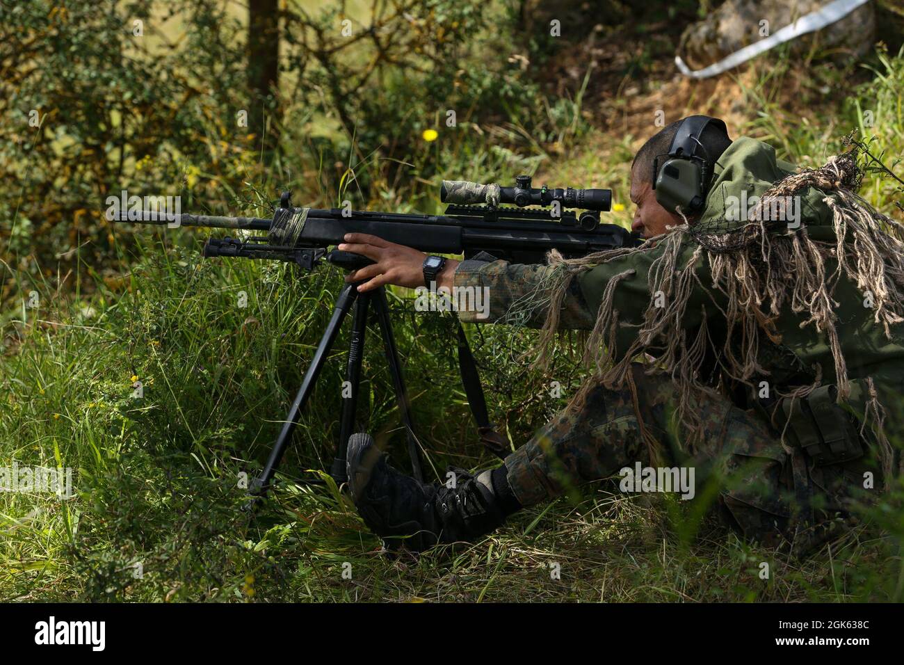 A Bulgarian soldier takes a firing position during the 2021 Best Sniper ...