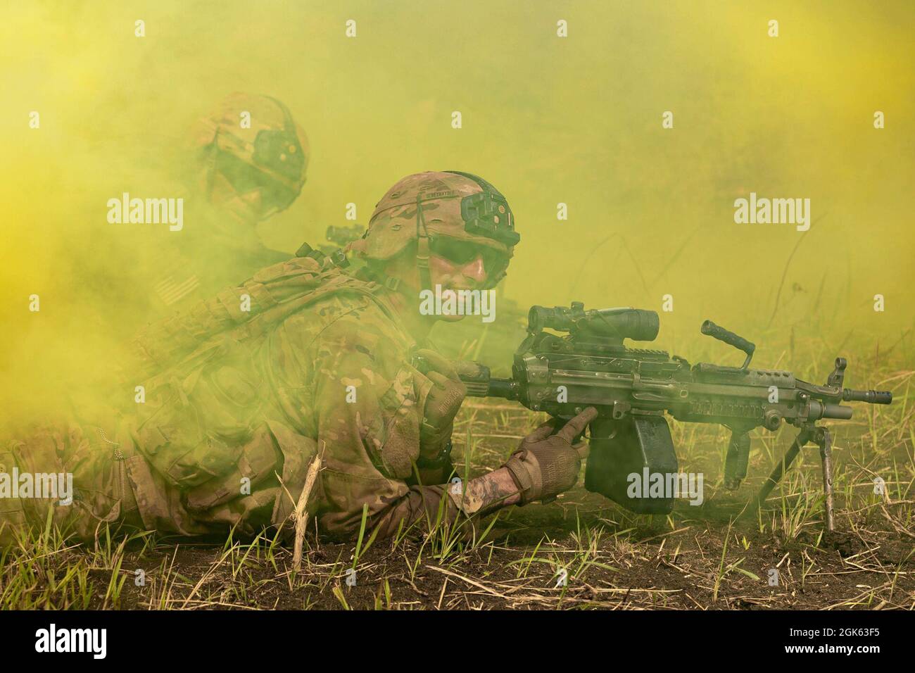 A U.S. Army Soldier with Task Force Warrior smiles through a yellow ...