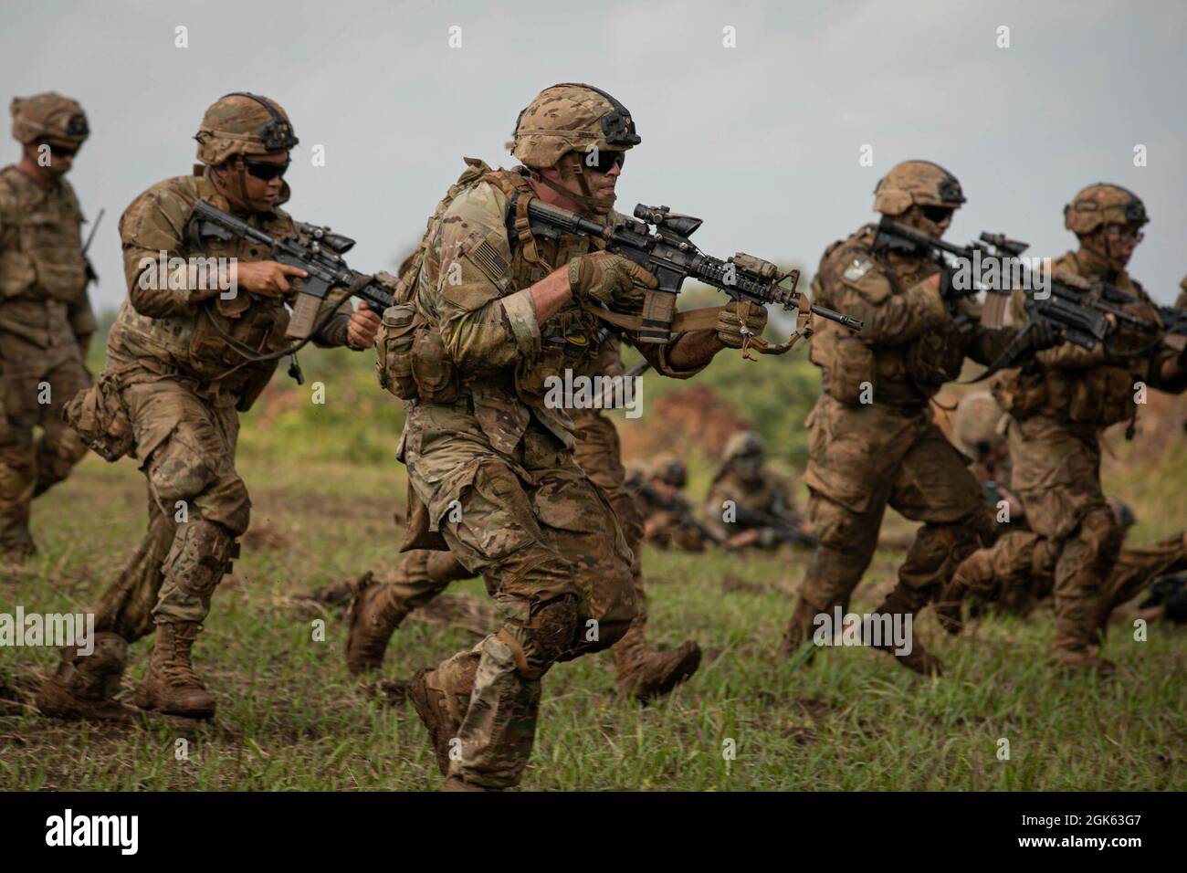 U.S. Army Soldiers with Task Force Warrior bound forward during a live ...