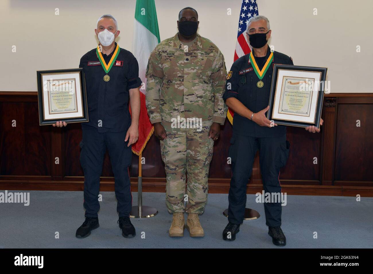 Command Sgt. Major Federico Brigo, left, Commander Operations Center of ...
