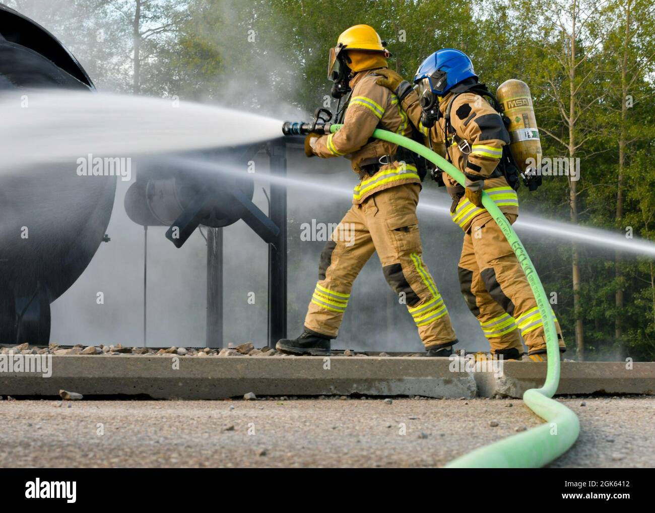 Firefighters with the Latvian National Armed Forces and Estonian ...