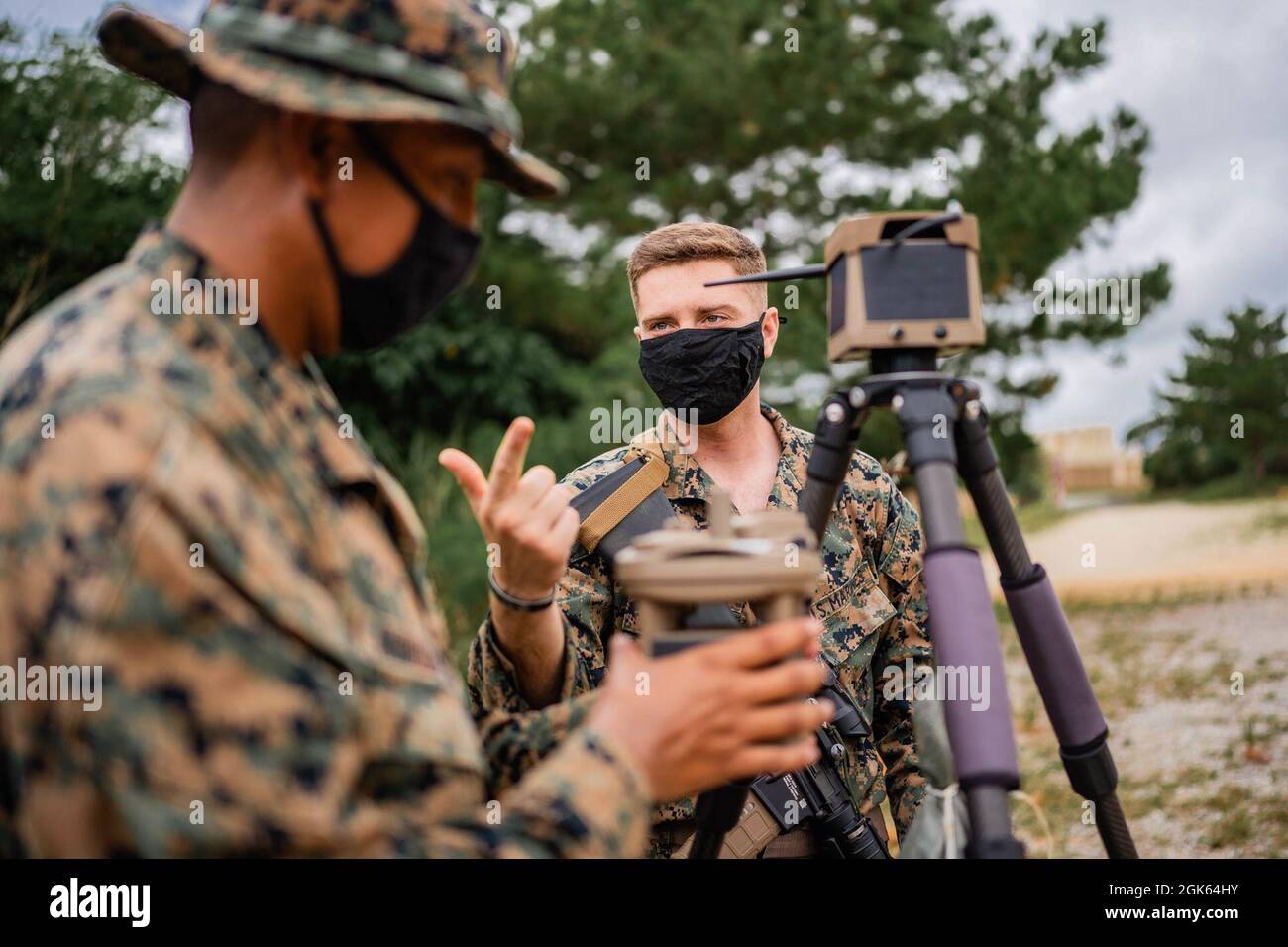 U.S. Marine Lance Cpl. Jean Rodriguez and Lance Cpl. Andrew Jeter ...