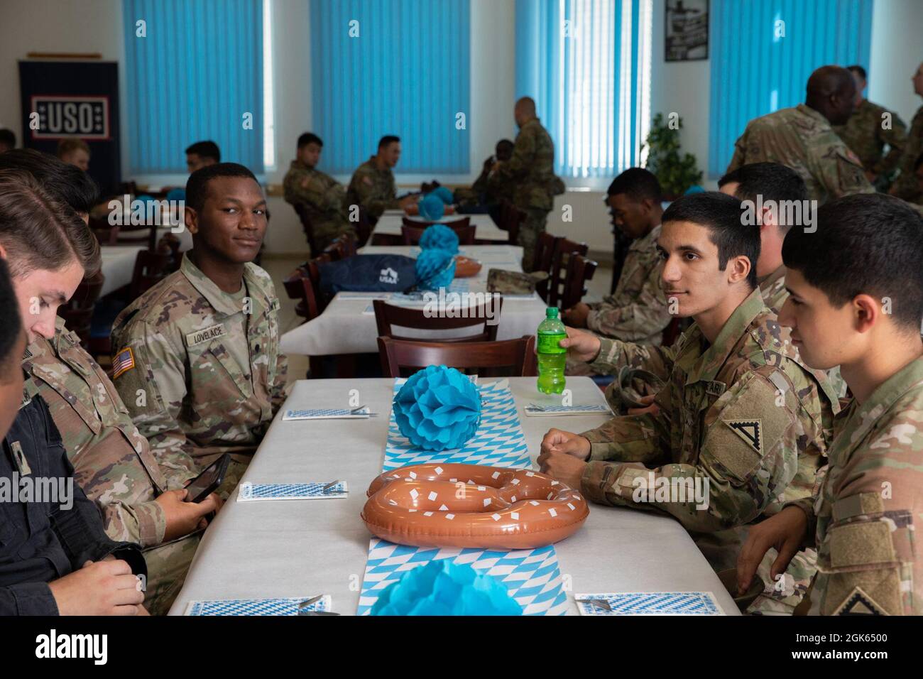 U.S. Army Soldiers attend a reception following the awards ceremony of ...