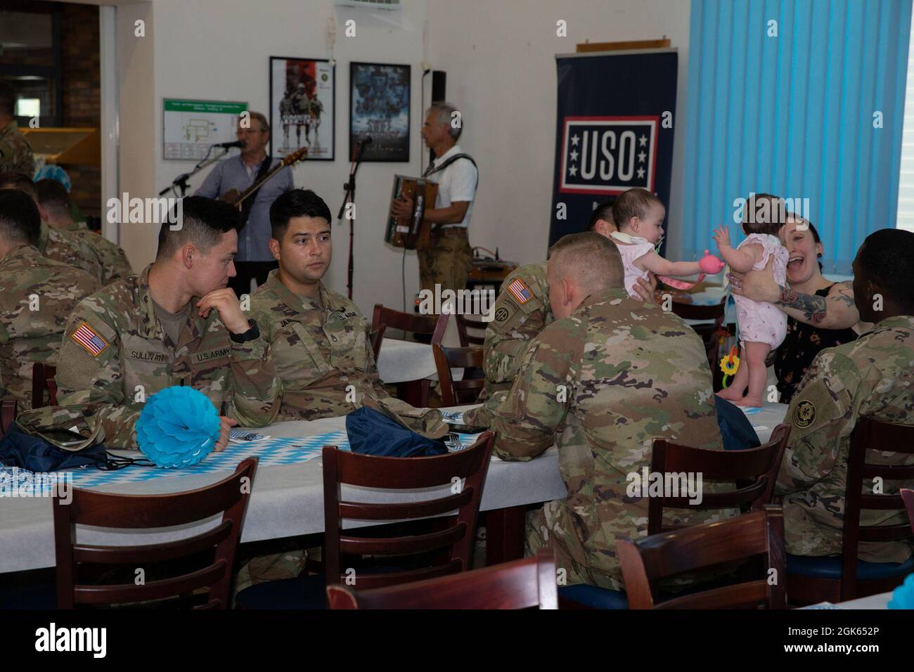 U.S. Army Soldiers attend a reception following the awards ceremony of ...