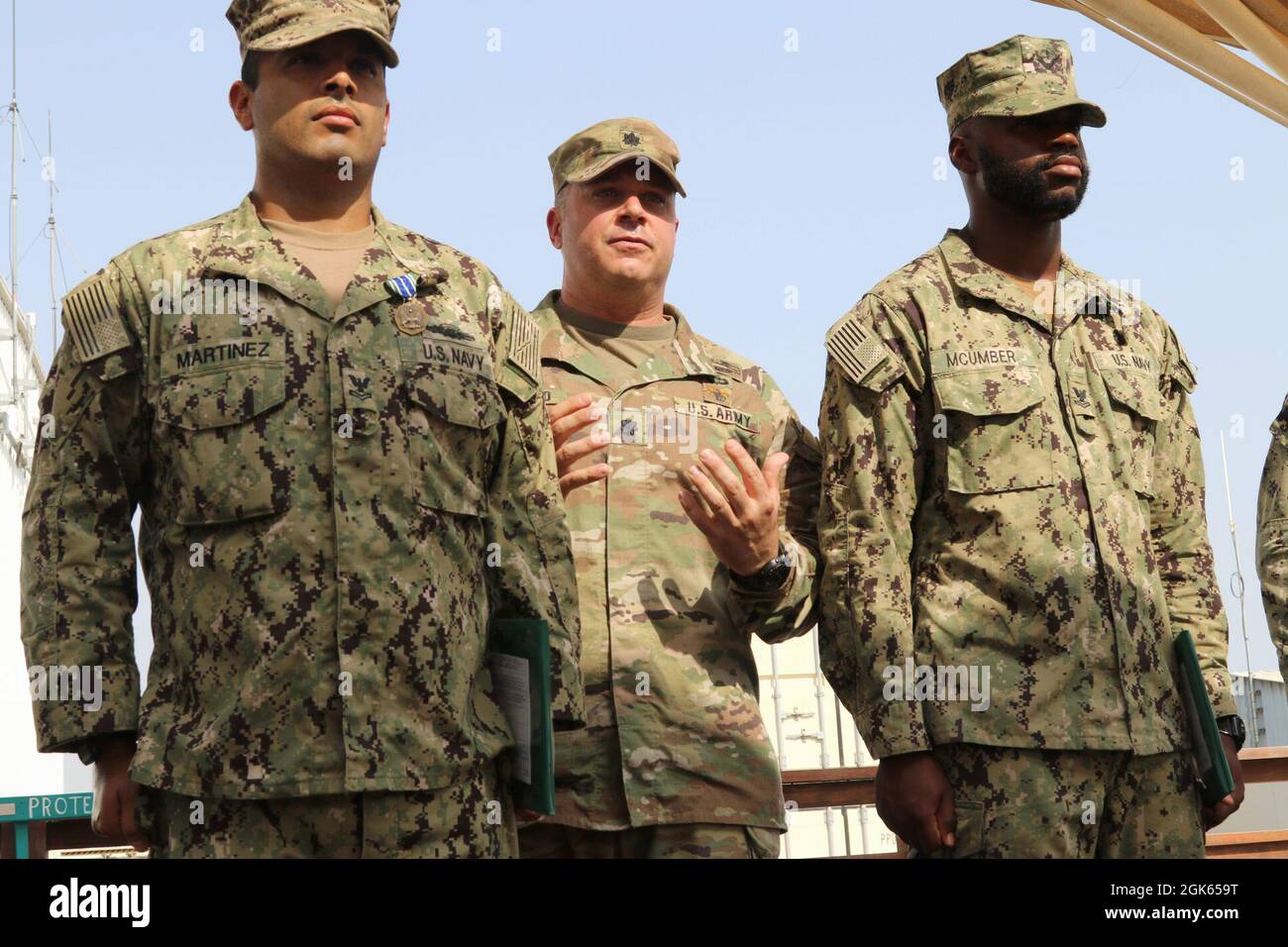 Lt. Col. Frank Tantillo, commander, Task Force Iron Gray, presents Army ...