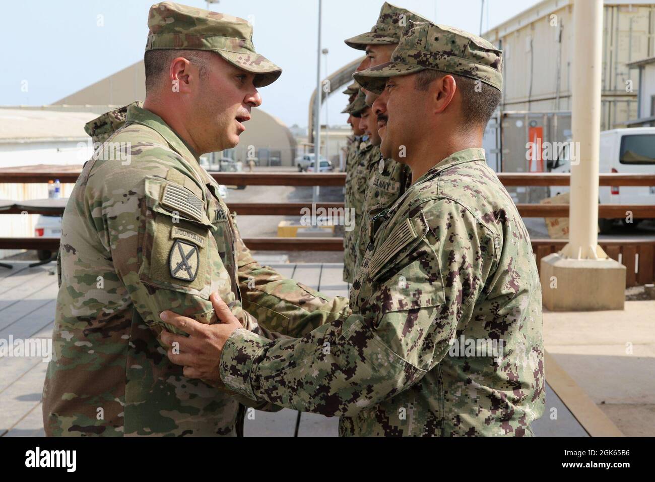 Lt. Col. Frank Tantillo, commander, Task Force Iron Gray, presents Army ...