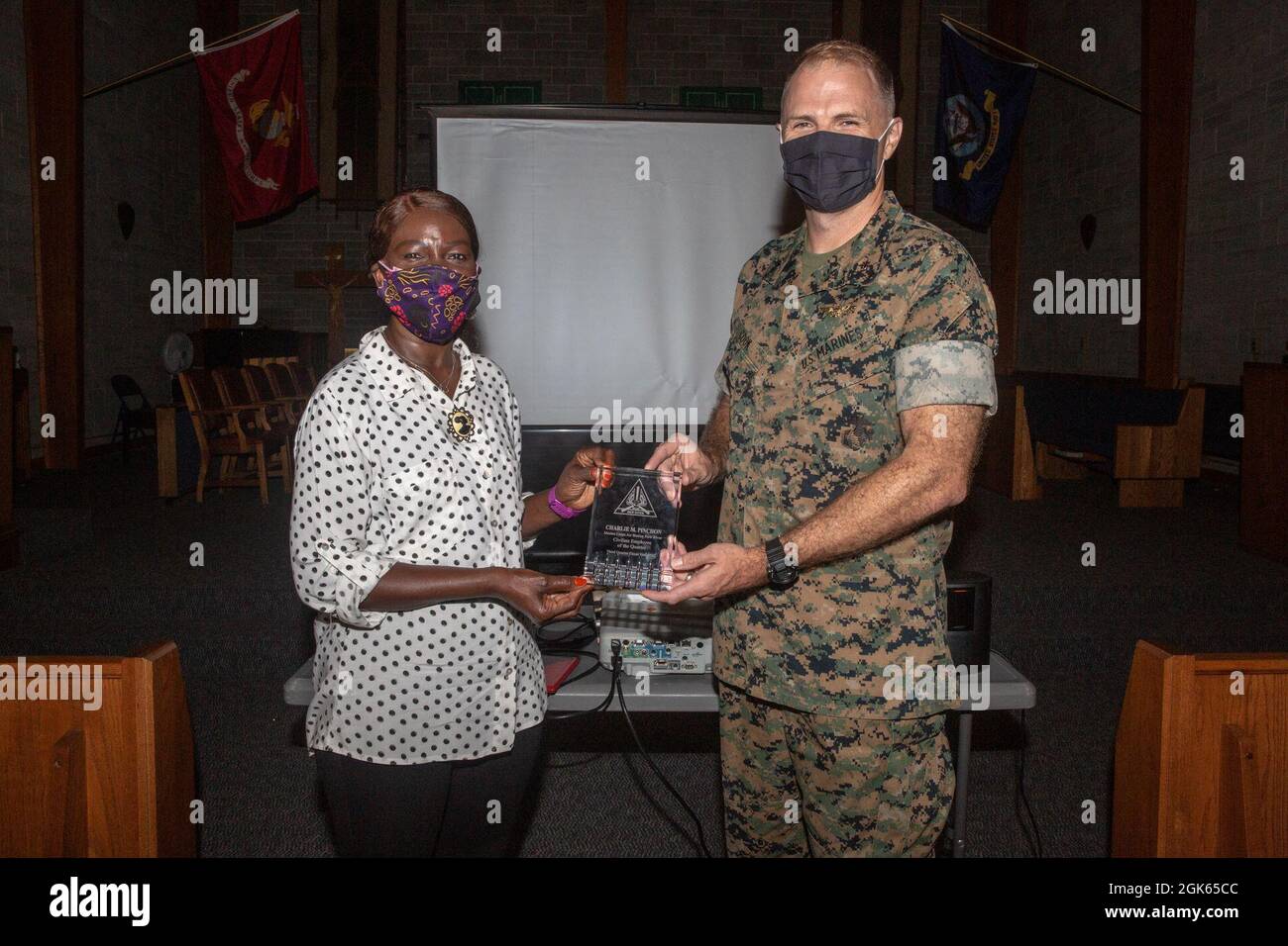 U.S. Marine Corps Lt. Col. Matthew P. Cook, right, executive officer ...