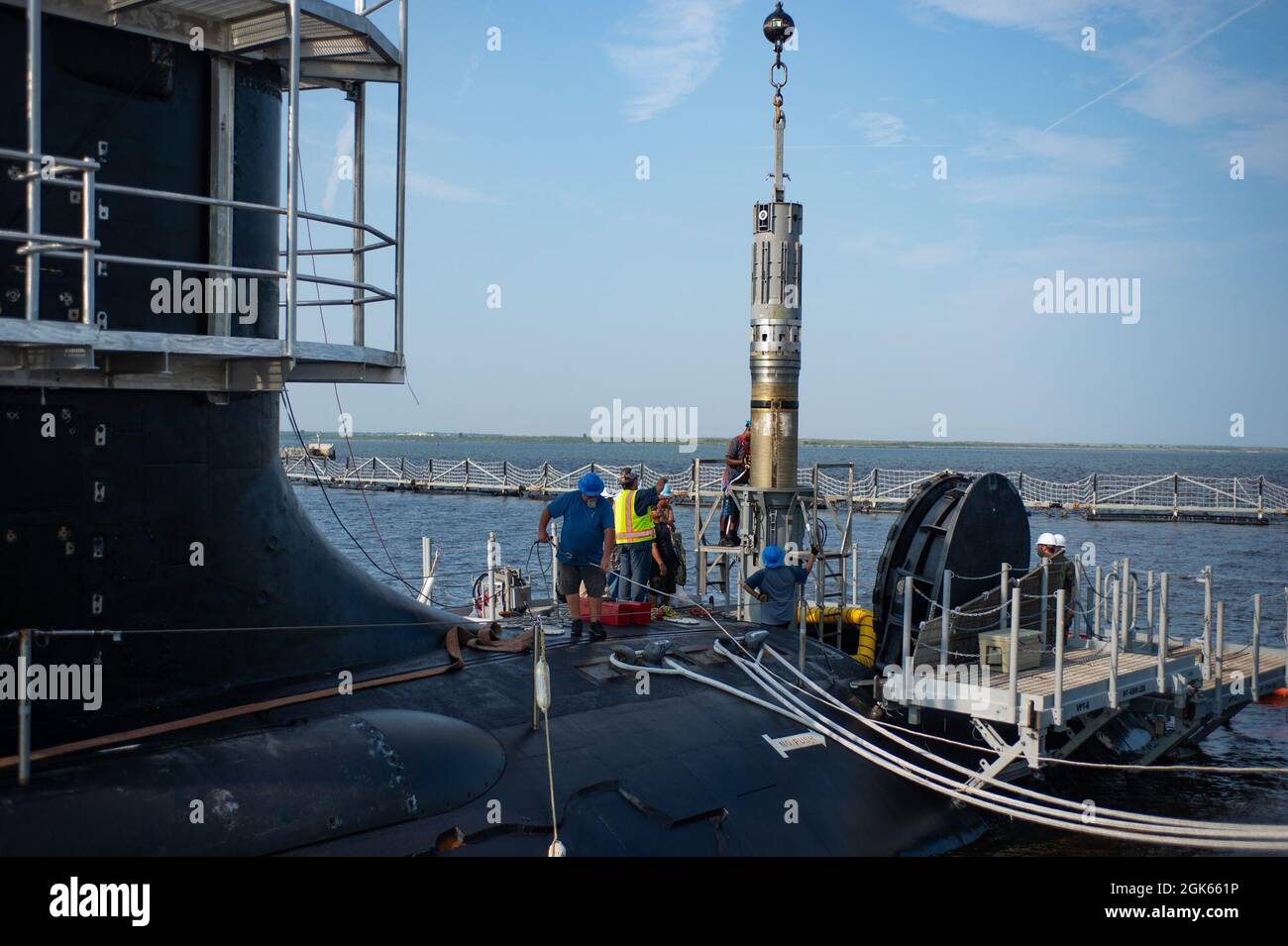 Sailors assigned to the Virginia-class fast-attack submarine USS ...