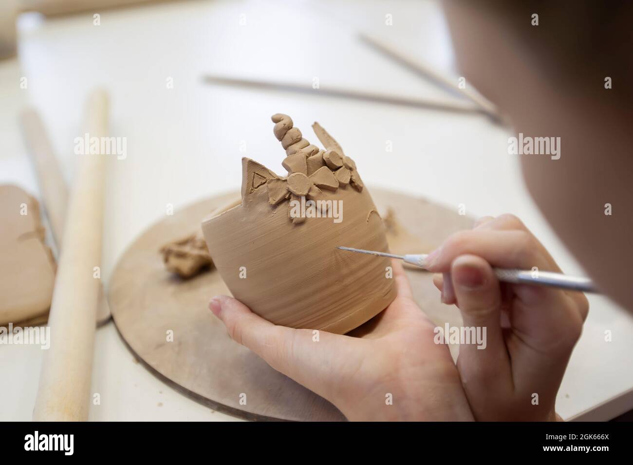 Potter sculpts a clay pot hi-res stock photography and images - Alamy