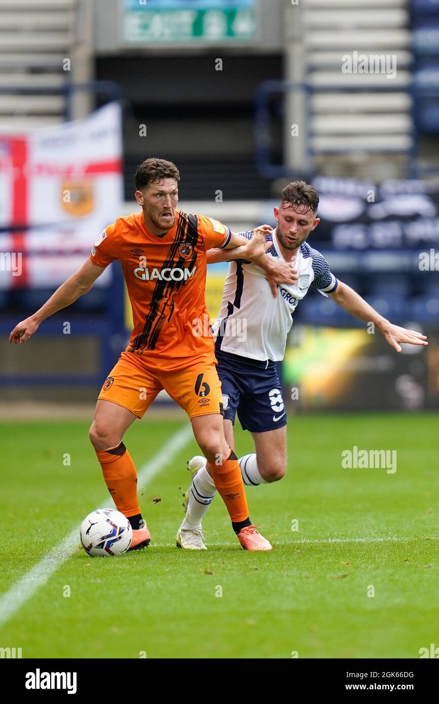 Hull’s Richard Smallwood shields the ball from Preston's Alan Browne ...