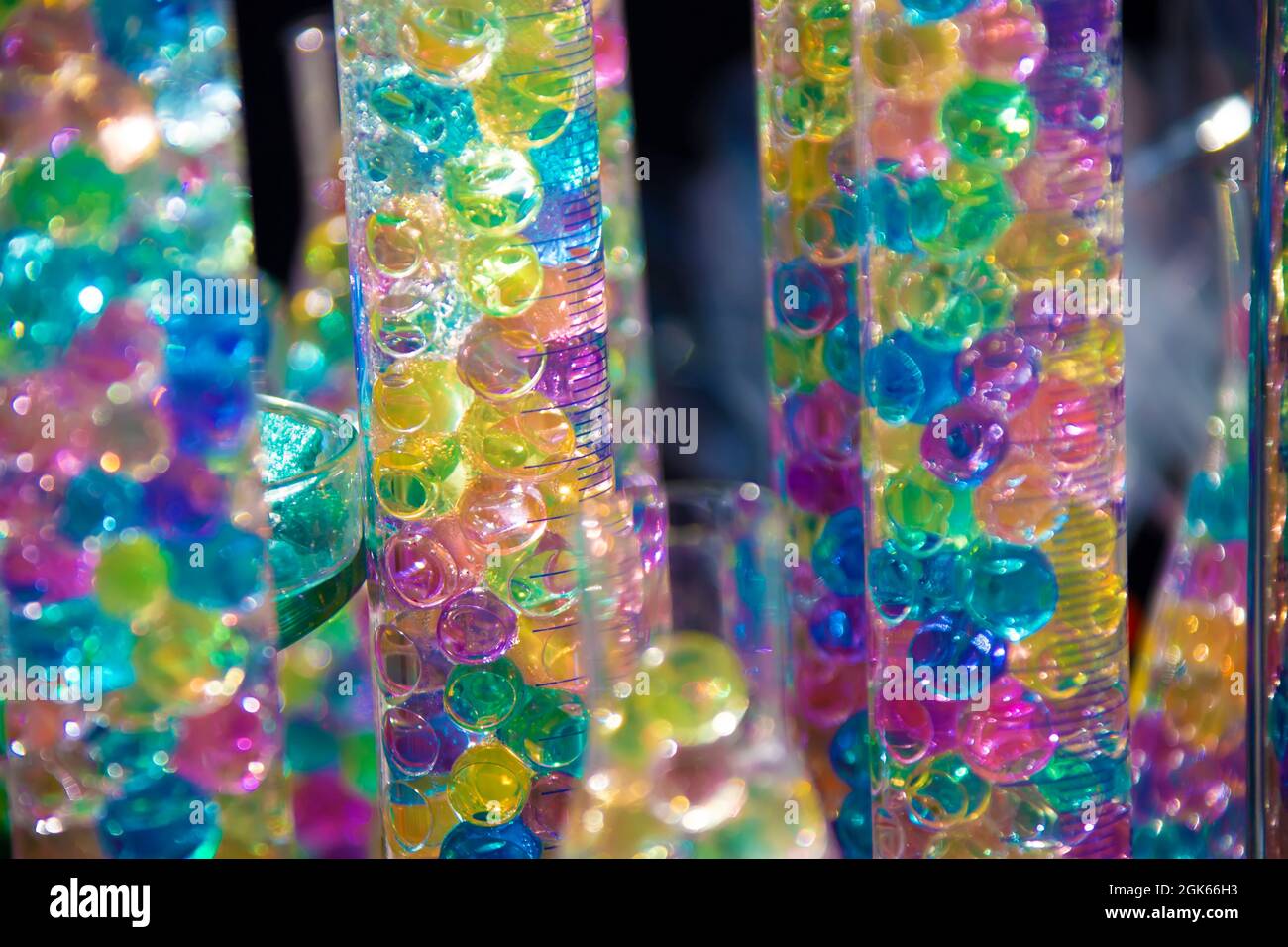 Bright colored balls in glass vessels Stock Photo - Alamy
