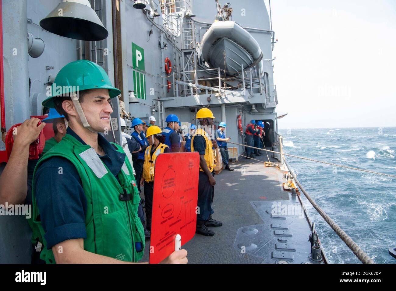 210812-N-JW440-1089 ARABIAN GULF (Aug. 12, 2021) – Ensign Stephen Kane ...