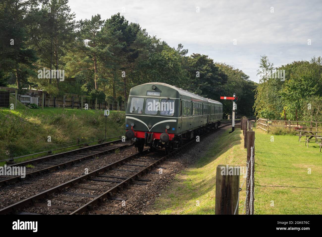 Diesel train arriving at Weyborne Station on the popular Poppy line in ...