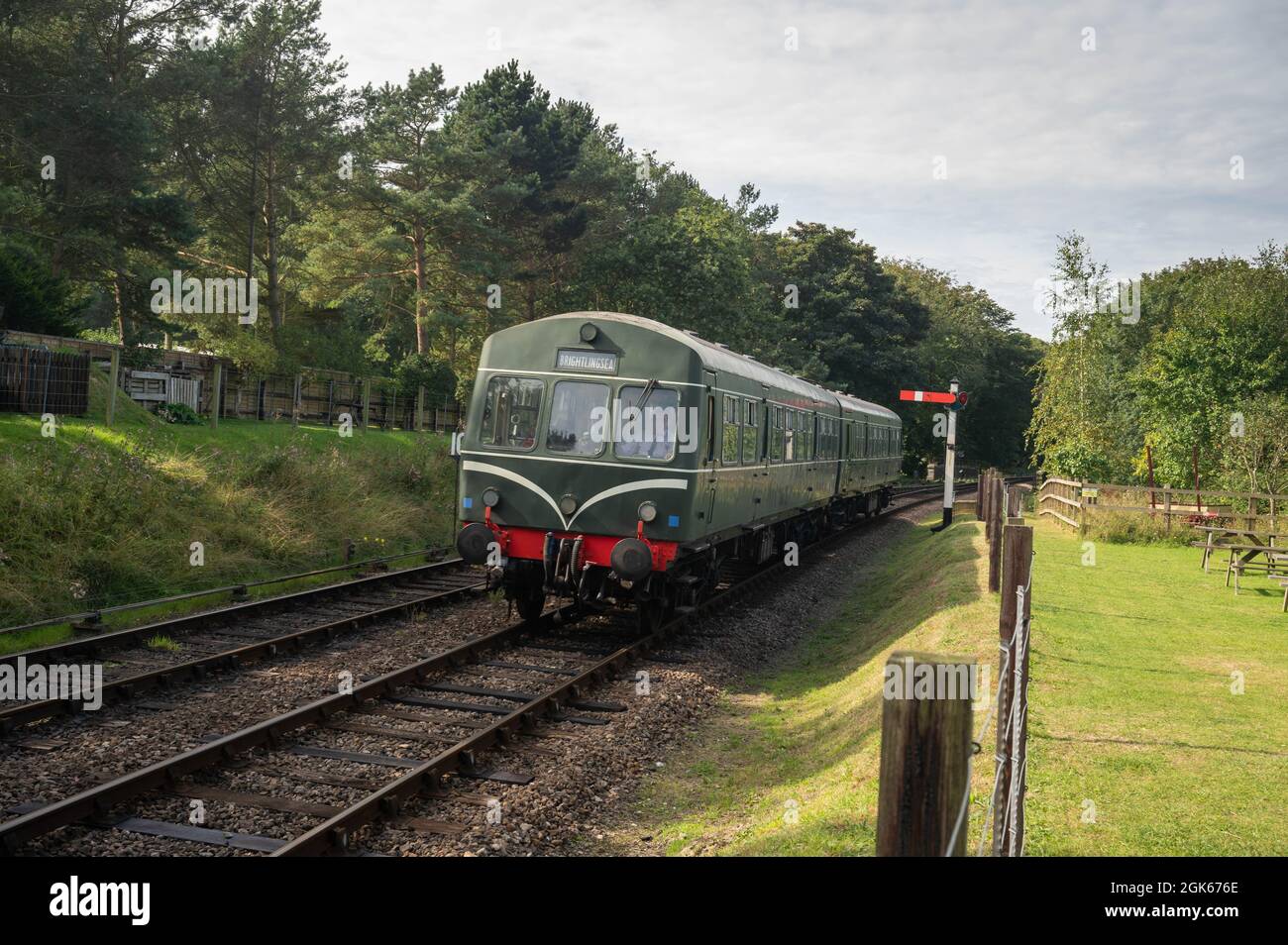 Diesel train arriving at Weyborne Station on the popular Poppy line in ...
