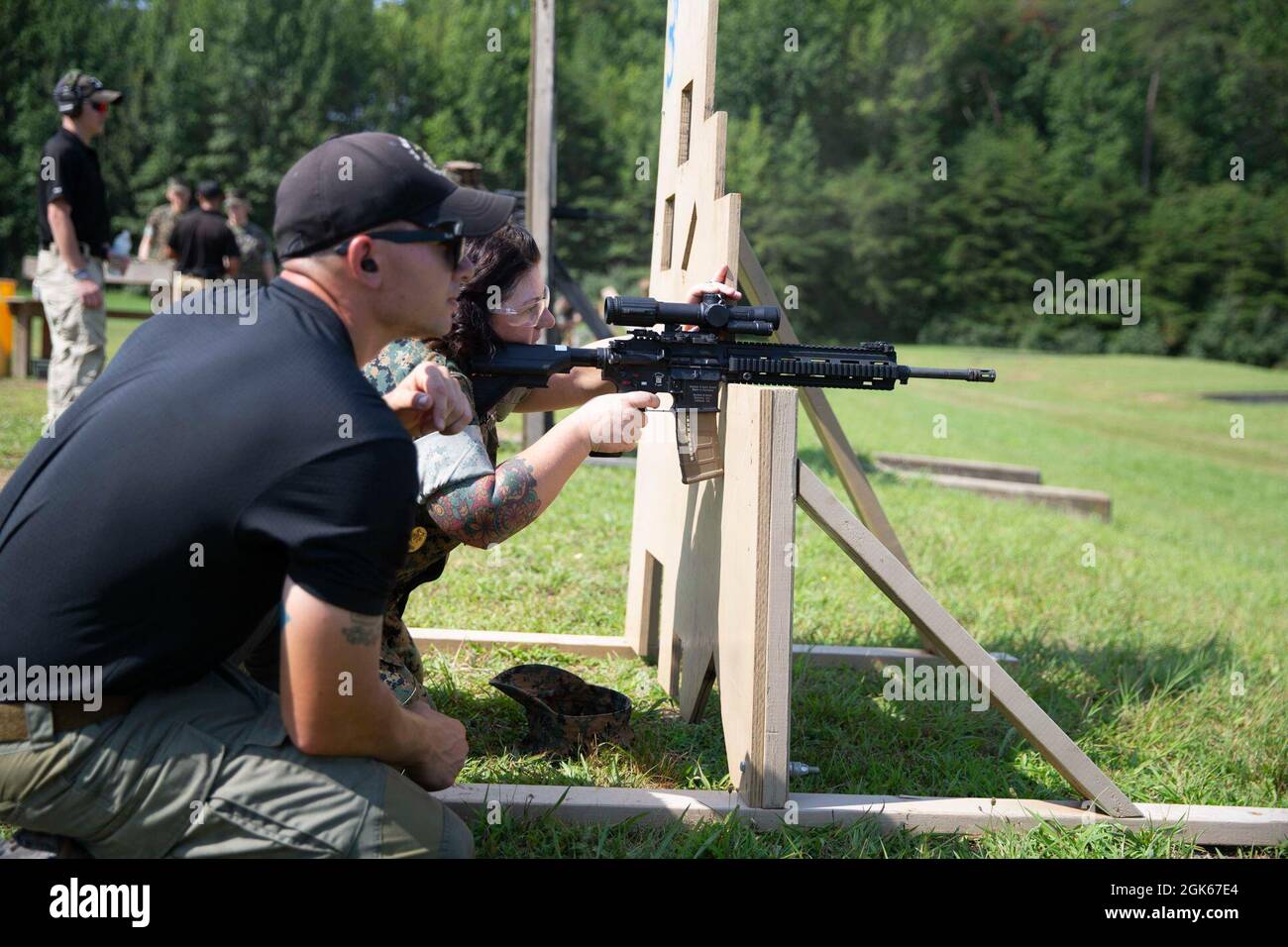 U.S. Navy Command Master Chief Carrie Weser, with U.S. Marine Corps ...